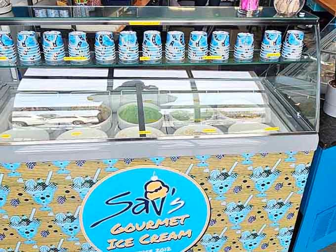 That simple oval sign outside tells you everything: Blue Door Smokehouse means business, delicious smoky business.