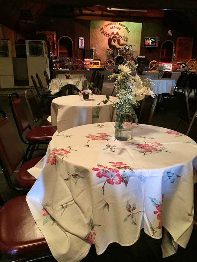 Tables dressed in floral linens for special events prove even haunted honky-tonks can clean up nice occasionally.