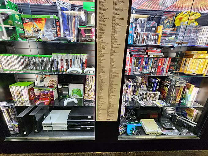 Retro gaming consoles sit behind glass like museum pieces, except these artifacts you can actually take home.