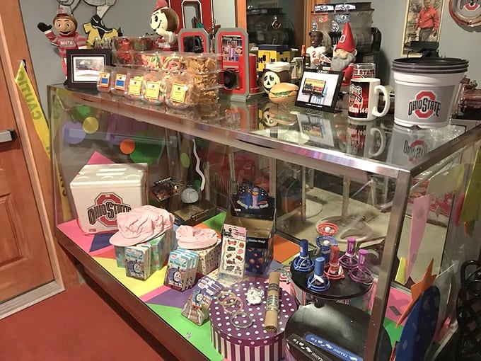 Ohio State pride meets vintage collectibles in this display case of nostalgia and local team spirit.