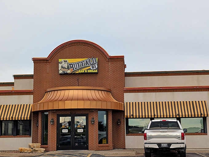 Buffalo61 Bar & Grille stands ready to satisfy hearty appetites with its inviting entrance and promise of classic American comfort food.