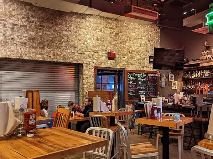 That exit view from inside, where exposed brick meets natural light and you're already planning your return visit.