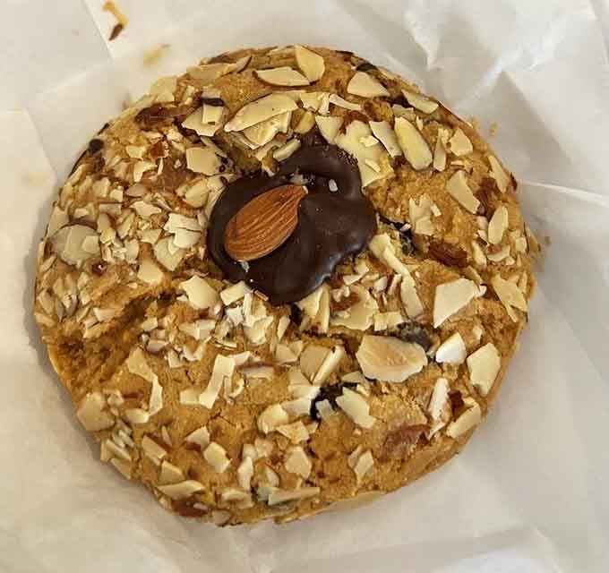 An almond cookie topped with a chocolate-dipped almond, because subtlety is overrated when it comes to flavor.