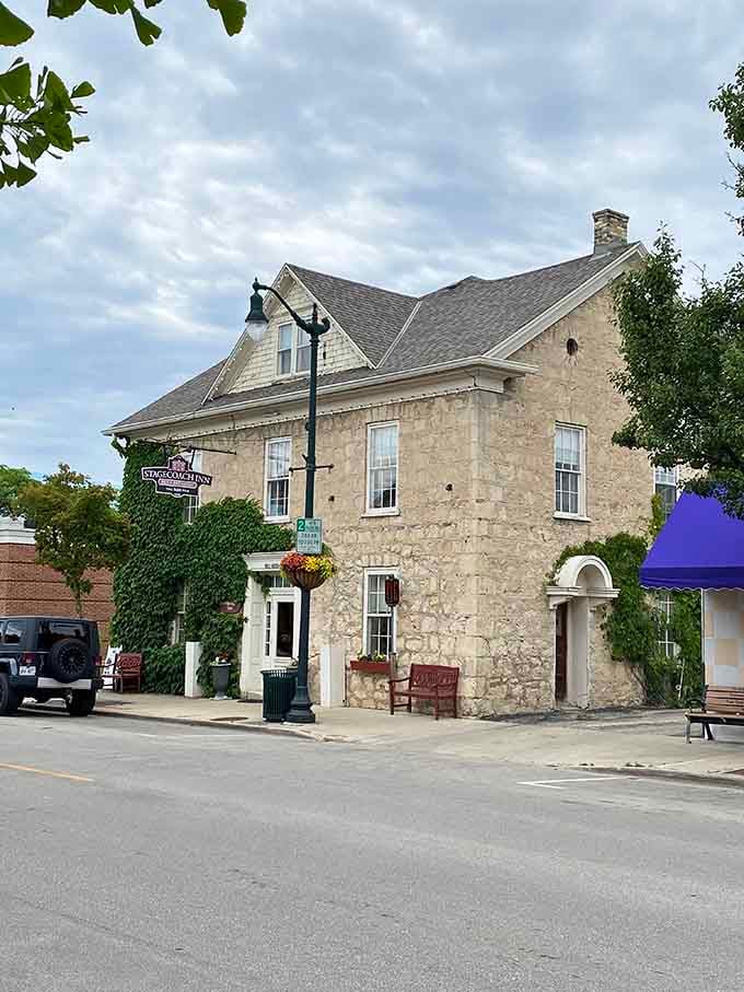 The Stagecoach Inn where limestone walls whisper stories from when stagecoaches were actually cutting-edge transportation technology back then.
