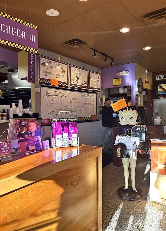 Even the check-in station has personality, complete with a cheerful mascot ready to welcome you to your morning meal adventure.