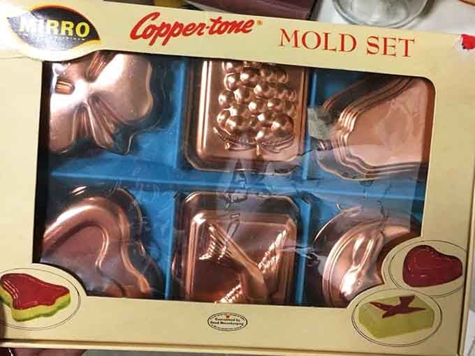 Coppertone mold sets proving that even Jell-O salads deserved to look fancy back in the day.