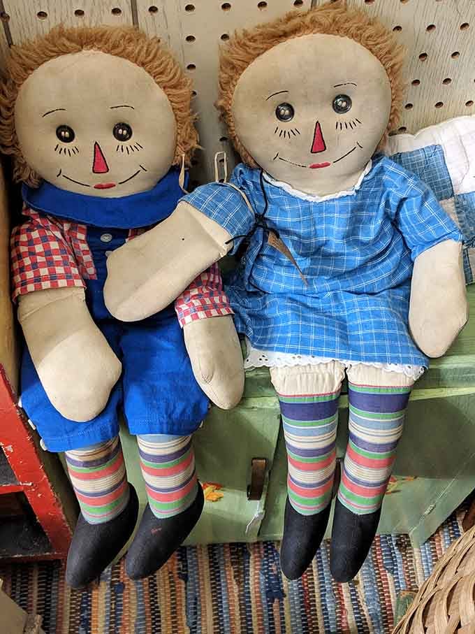 Raggedy Ann and Andy dolls with that vintage charm that's simultaneously adorable and slightly haunted after midnight.