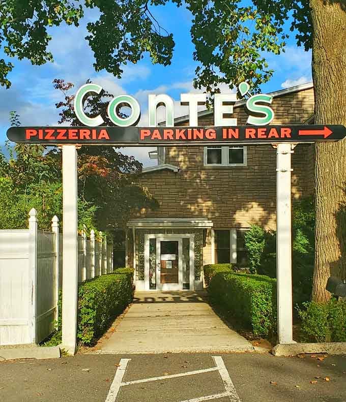 The classic storefront with its retro sign proves that some things get better with age, not facelifts or renovations.