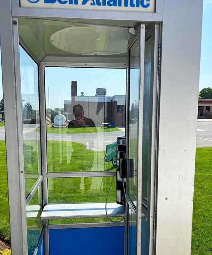 An actual vintage payphone stands ready, just in case you need to call 1955 and let them know everything's fine.