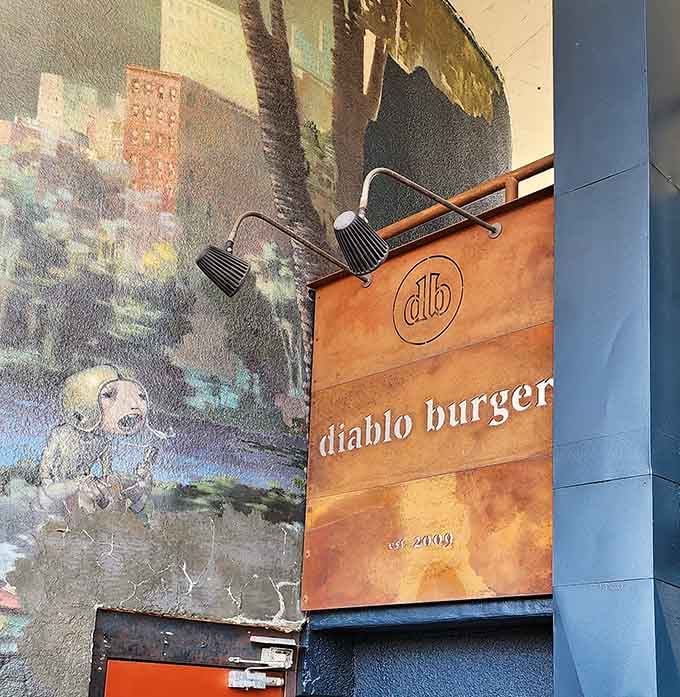 The copper signage against that striking mural announces you've arrived at something special in downtown Flagstaff.