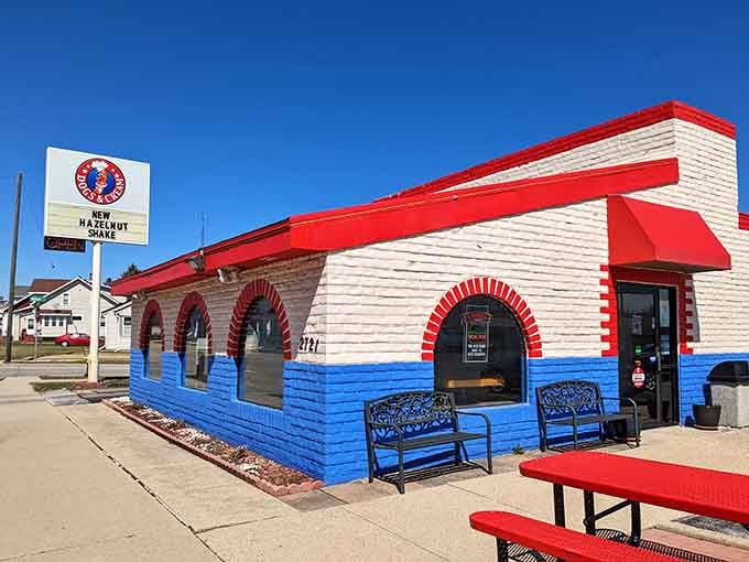 Kewpee Hamburgers' distinctive red, white, and blue building promises the kind of straightforward American comfort food that never goes out of style.