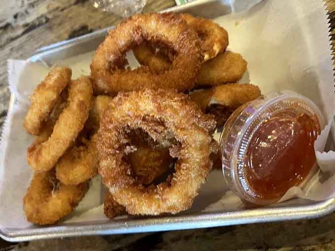 Golden calamari rings and fries, because sometimes the simple pleasures are the ones that hit hardest and taste best.