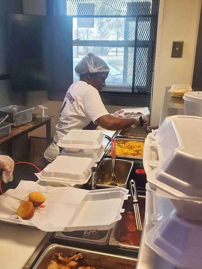 The cafeteria line where magic happens, watching your plate get loaded with portions that suggest someone's grandmother is in charge.