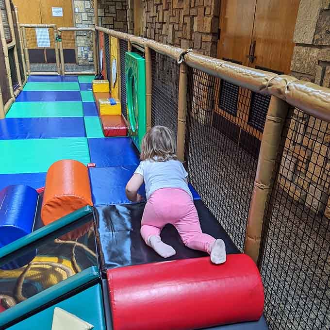 The soft play area gives toddlers their own space to explore without getting trampled by the bigger kids.