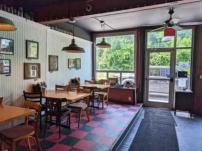 The indoor dining room keeps things simple with wooden tables where strangers become friends over ribs.