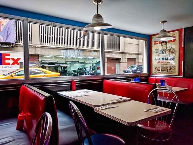 Window seats offer prime people-watching while you enjoy your meal, though the real show happens inside these walls.