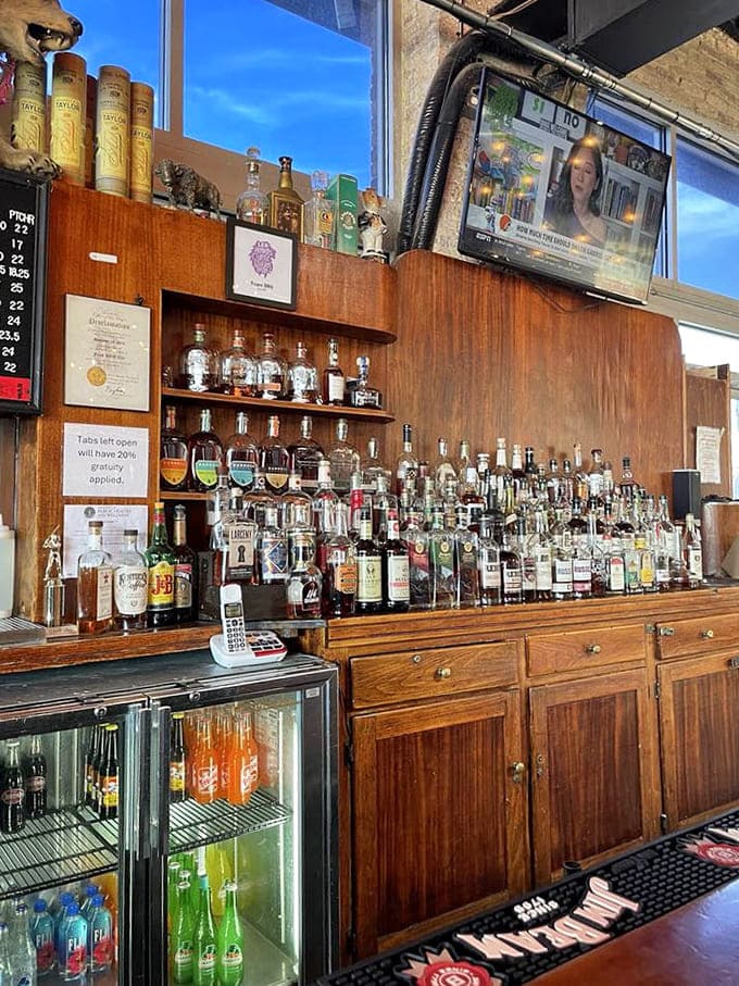 Behind the bar, enough bourbon to make Colonel Sanders himself raise a glass in appreciation.