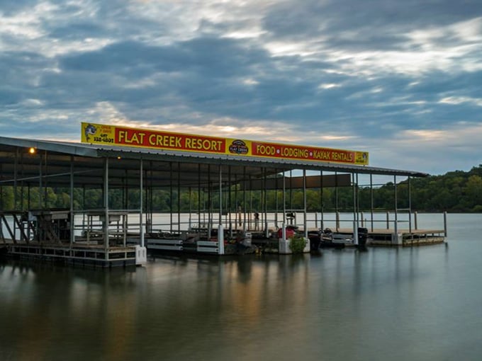 The boat dock at sunset reminds you that some restaurants understand location is half the magic of dining.