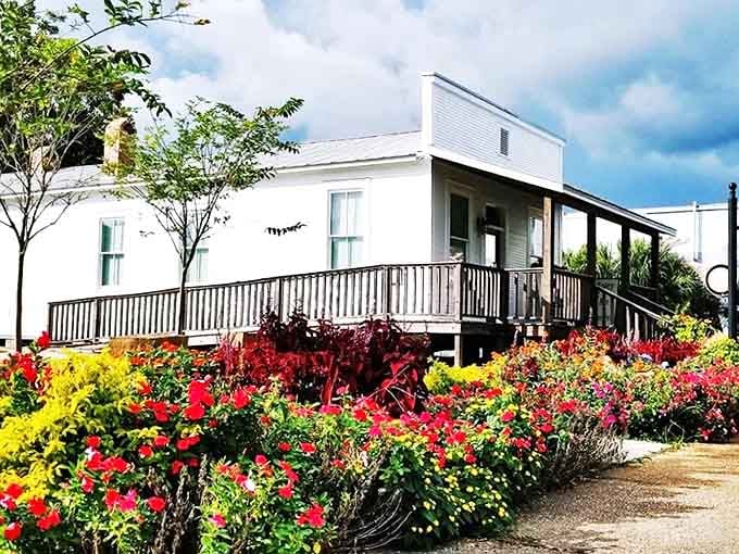 Vibrant flowers frame this charming building, creating a living canvas that complements the artistic treasures housed in the Foley Art Center.