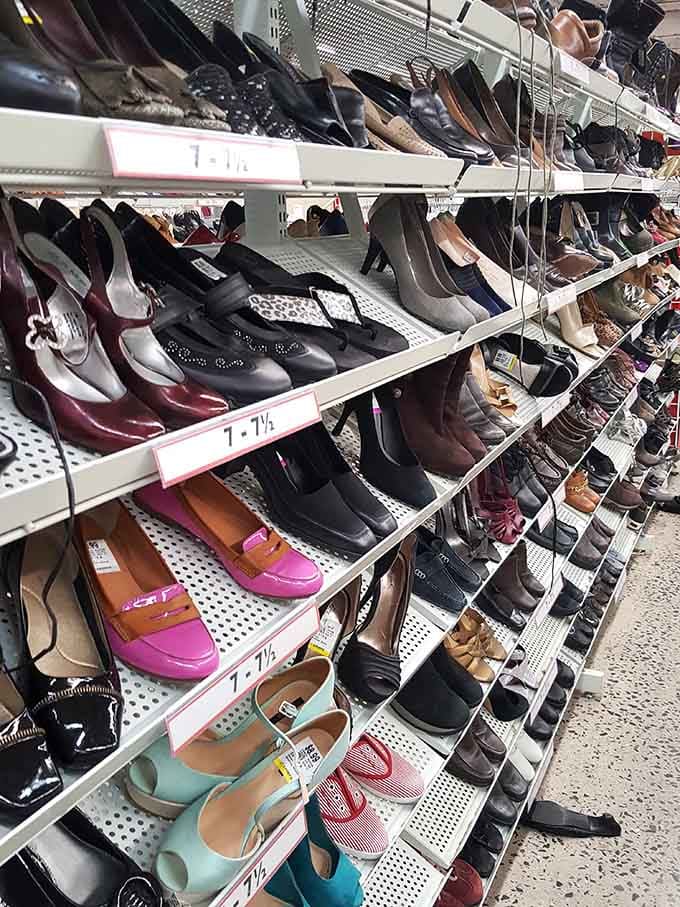 The shoe section: a footwear fantasy where designer pumps mingle with practical flats, all waiting for their Cinderella moment.