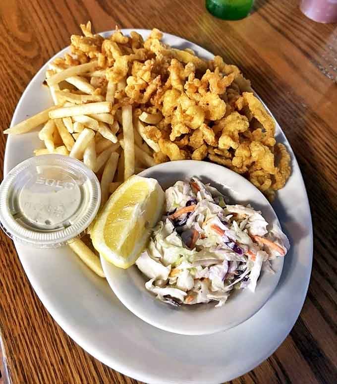 These golden fried clam strips with their perfect crunch are what Connecticut seafood dreams are made of.