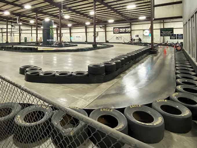 Those tire barriers snake around the track's perimeter, ready to forgive your mistakes with gentle rubber cushioning.