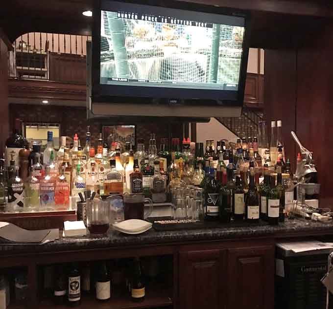 A well-stocked bar ensures your wait time passes pleasantly with cold drinks and good company.