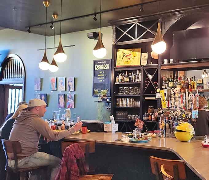 Classic diner-style counter seating with chrome stools, perfect for solo breakfast contemplation and people-watching.