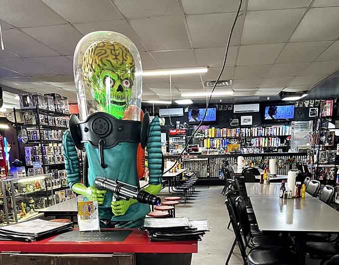 Board games line the shelves above dining tables, inviting guests to stay awhile and play between bites.