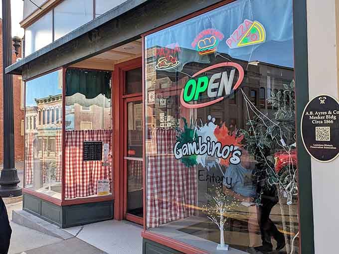 At Gambino's Eatery, the checkered curtains and neon sign signal comfort food that makes you feel like you've been invited to Sunday dinner.