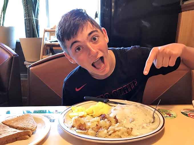 Pure joy captured in one expression says everything about the generous portions served here daily.