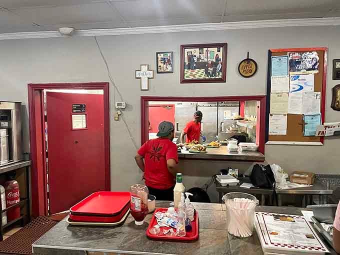 Behind that service window, skilled hands are turning out plate after plate of the kind of cooking that keeps people coming back.