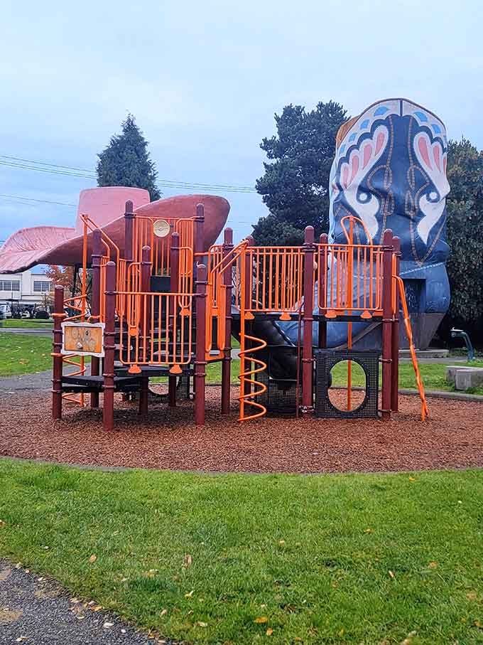 Modern playground equipment meets vintage roadside Americana in this uniquely Seattle combination of old and new.