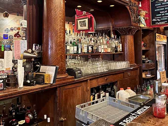 The classic wooden bar serves everything from morning coffee to evening beers without missing a single beat.