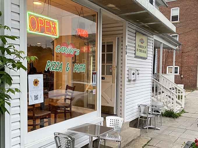 Corner pizza joint with big windows, where you can watch Main Street while waiting for your order to arrive.
