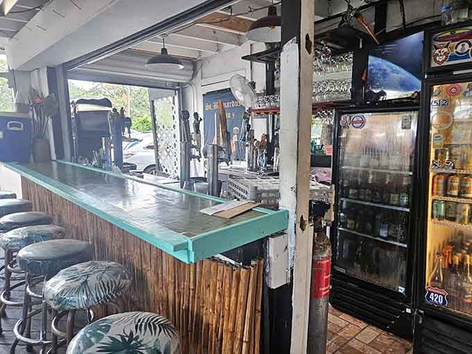 A turquoise bar ready to serve everything from coffee to cocktails for thirsty adventurers and locals.