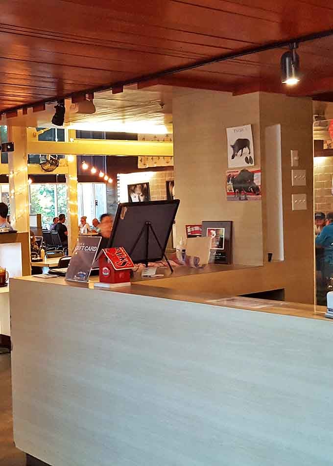 The host station stands ready for the dinner rush, where locals and travelers alike will soon form a hungry, hopeful line.