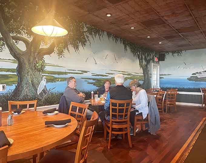 These happy diners surrounded by marsh murals have clearly discovered what locals have known all along about this place.