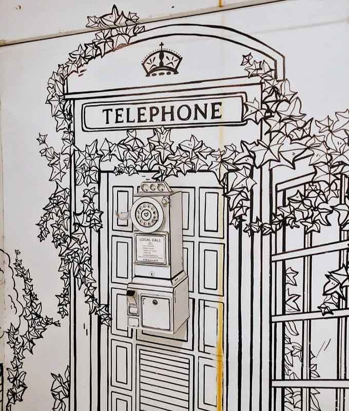 This two-dimensional telephone booth looks so real you might actually try to make a call before remembering it's drawn.