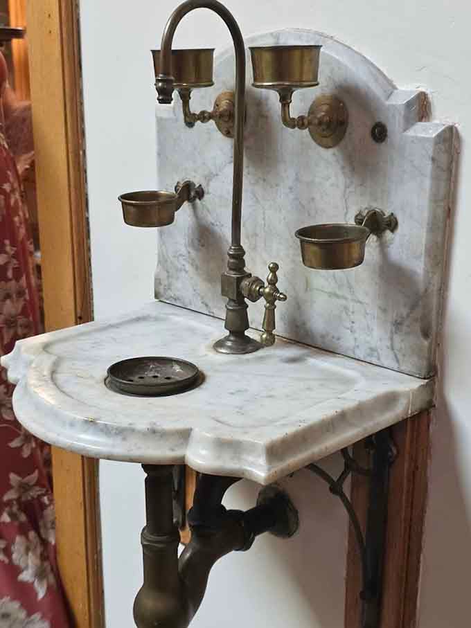 This marble sink has witnessed more hand-washing than a modern germaphobe could ever dream of accomplishing.