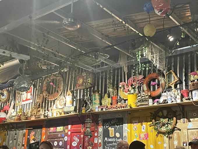 The ceiling collection rivals most museums, except these artifacts pair perfectly with cold beer and burgers.