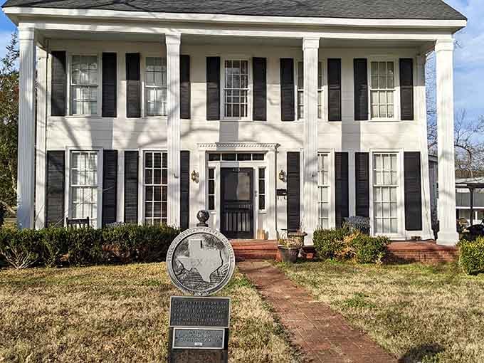 This stately white mansion with black shutters stands as testament to Jefferson's prosperous riverboat era.