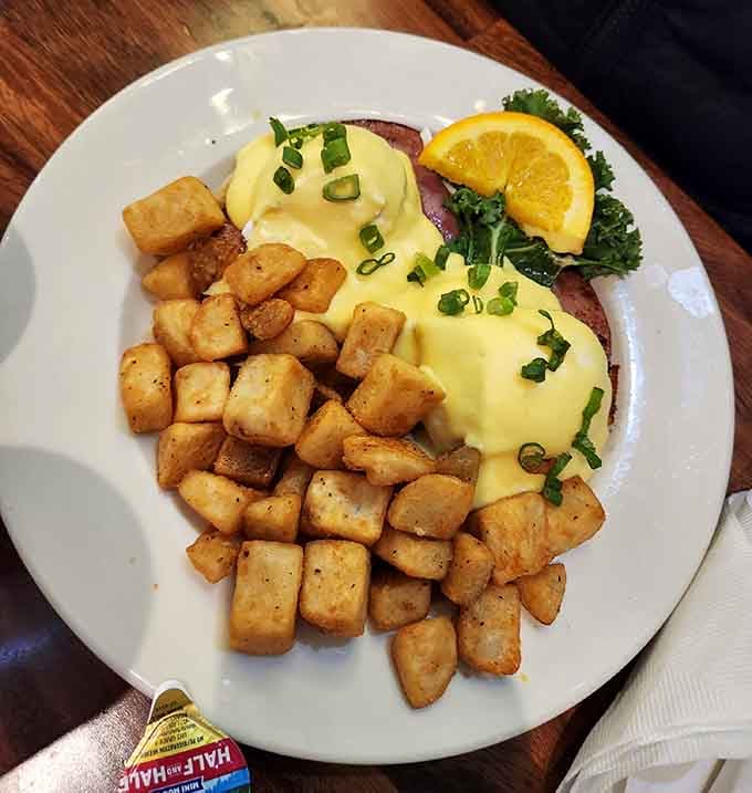 Eggs Benedict with golden hollandaise and crispy breakfast potatoes elevates your morning to something truly special and memorable.