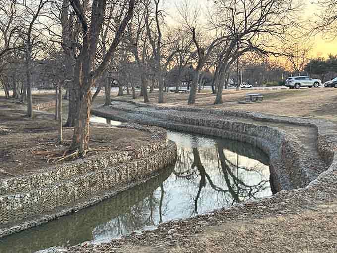That tranquil stream adds natural beauty to the park, giving families a peaceful backdrop for their high-energy adventures today.