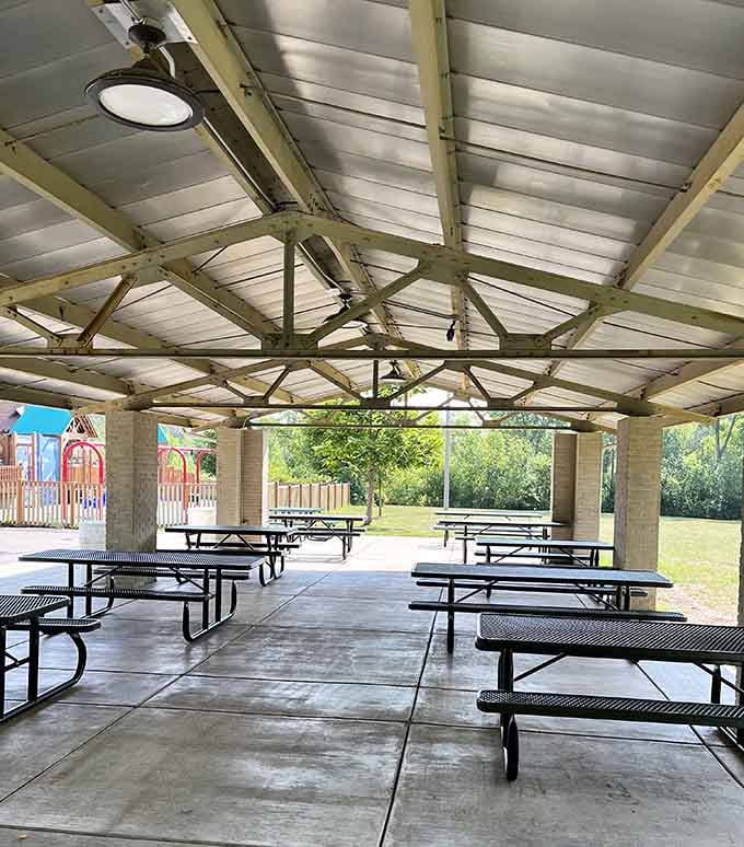 Covered picnic pavilion means parents can actually sit down and relax while maintaining clear sightlines to their playing children.