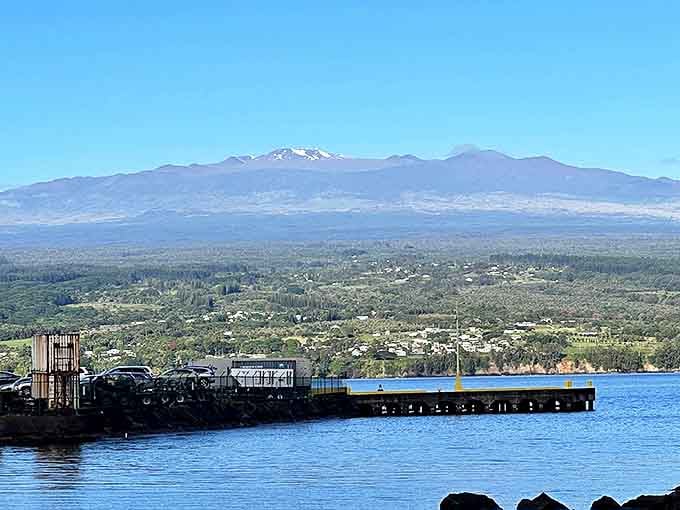 Mauna Kea stands sentinel over Hilo Bay, its occasionally snow-capped peak visible from town on those rare clear days.