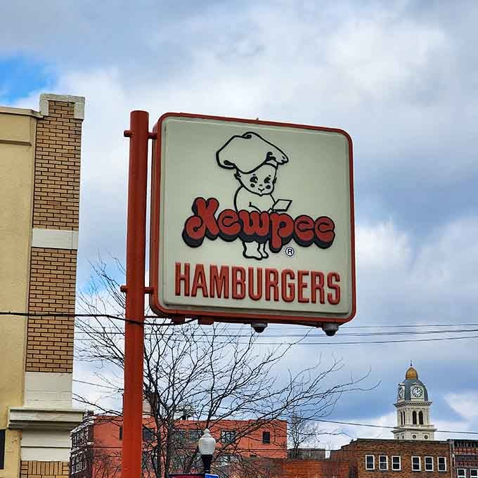 The cheerful Kewpee chef mascot has been welcoming hungry travelers for generations with that same friendly smile.