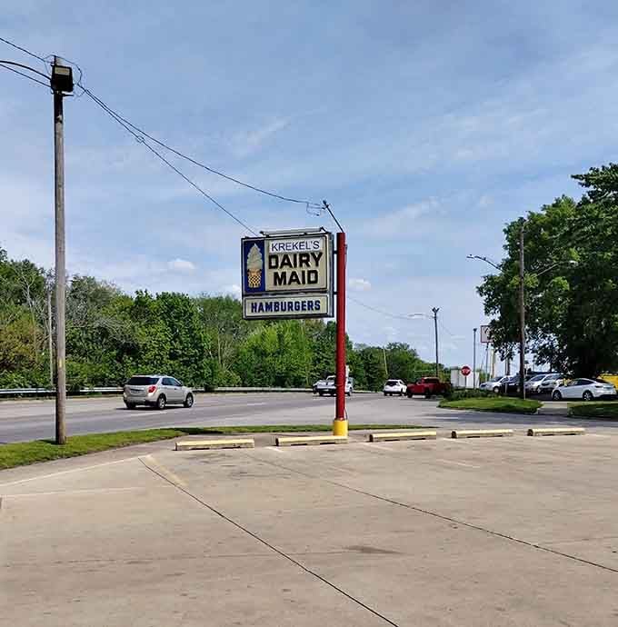 That vintage roadside sign pointing the way is like a beacon calling hungry travelers to their happy place.