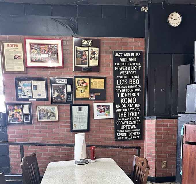 Exposed brick, framed memories, and Kansas City pride displayed on walls that have witnessed countless perfect meals over the years.