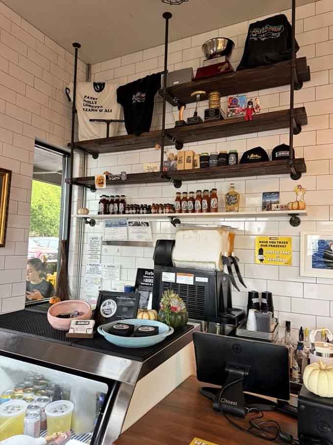 Open shelving stocked with sauces, merchandise, and barbecue essentials shows this place has style beyond just the smoker.
